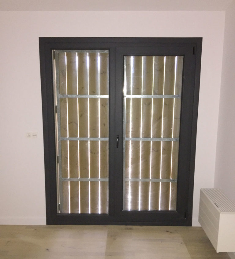 Puerta balconera de PVC - CARPINTERIA MINTXEGI